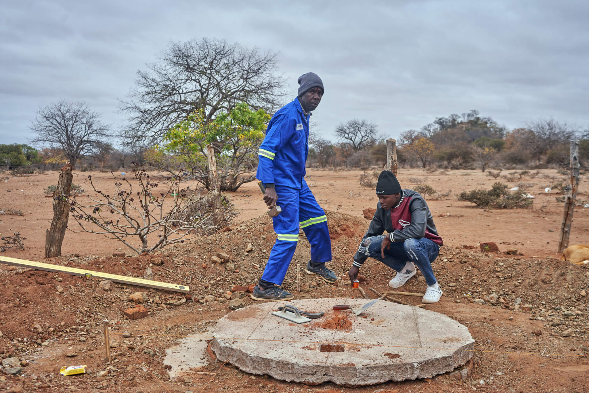 How Do You Build a Pit Latrine? One Brick at a Time